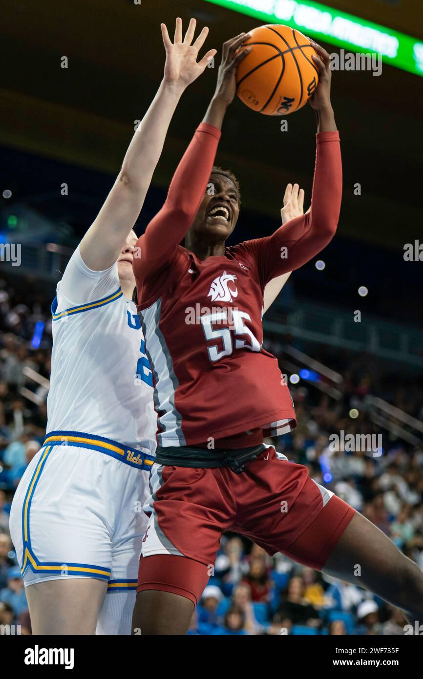 Washington State Cougars center Bella Murekatete (55) grabs a rebound ...