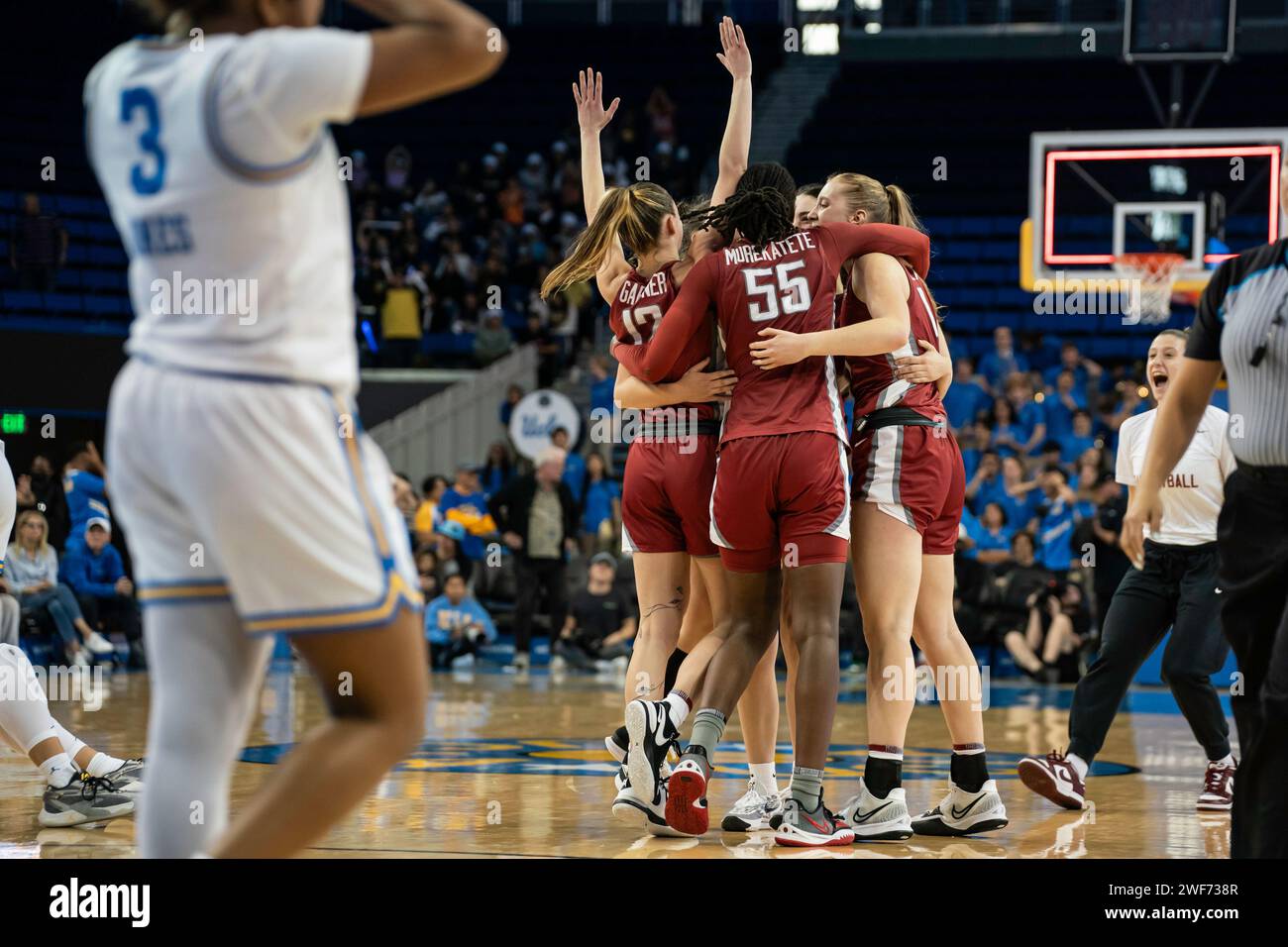 Washington State Cougars center Bella Murekatete (55) and teammates ...