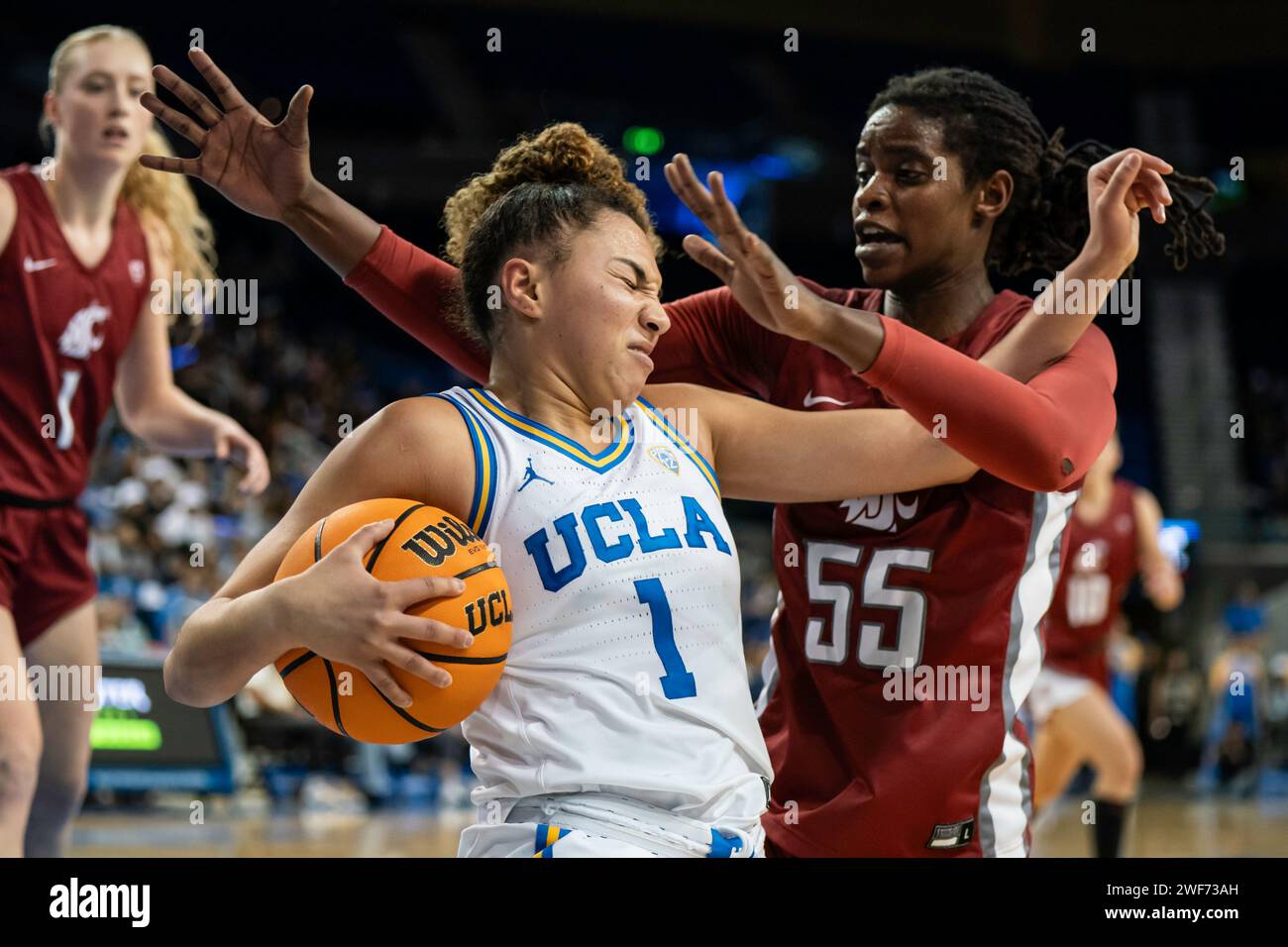 UCLA Bruins guard Kiki Rice (1) fends off Washington State Cougars ...