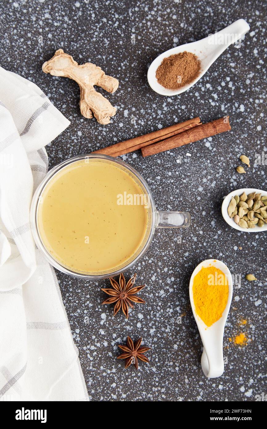 Traditional masala tea, healthy indian drink with spices star anise ...