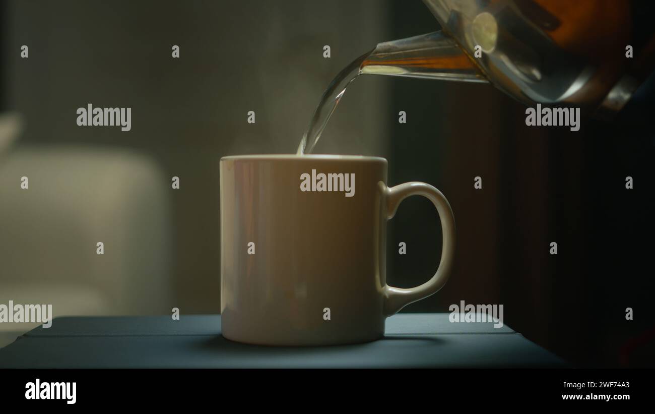Close up pouring hot water hi-res stock photography and images - Alamy