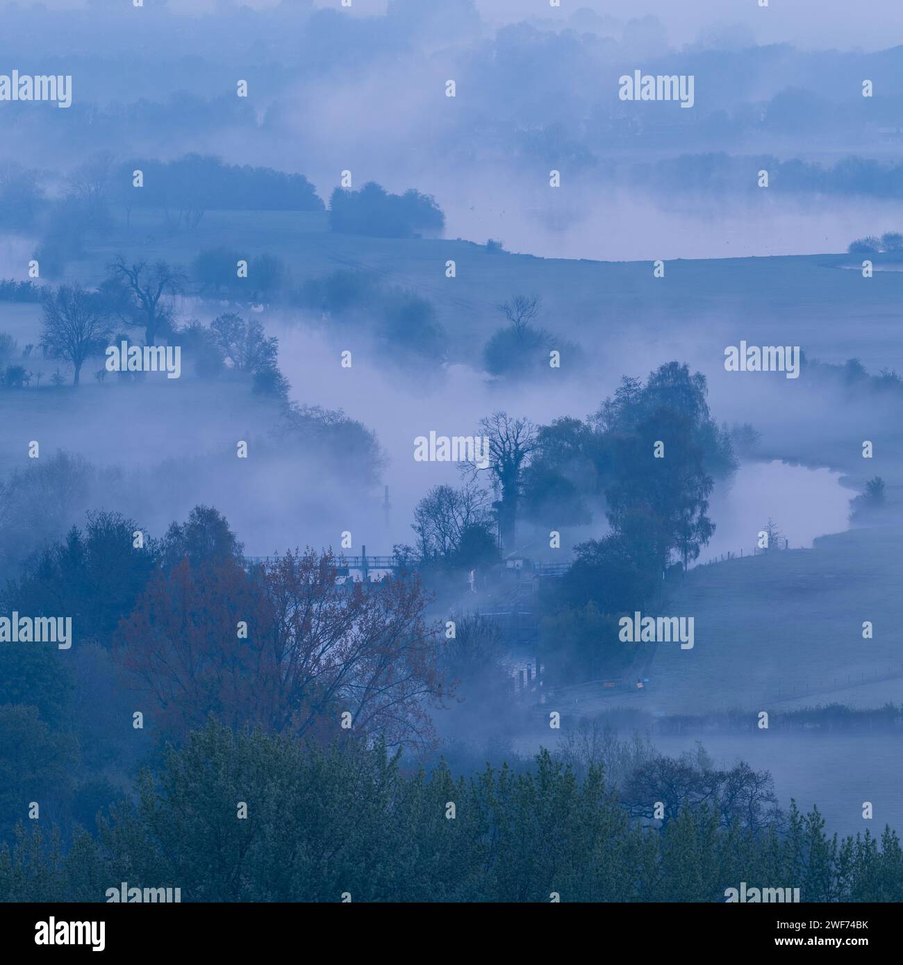 Misty view of river Thame from Wittenham Clumps Oxfordshire Stock Photo ...