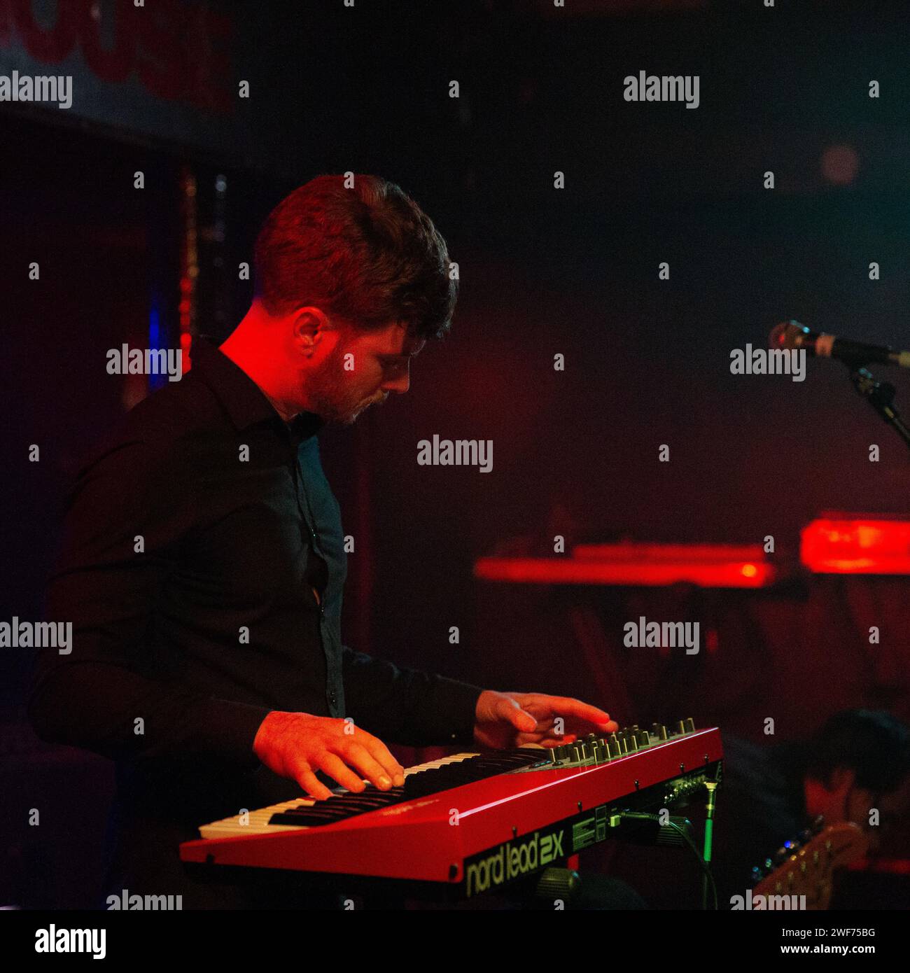 Scott Eton, guitarist and keyboardist of Ballerina Black performing ...
