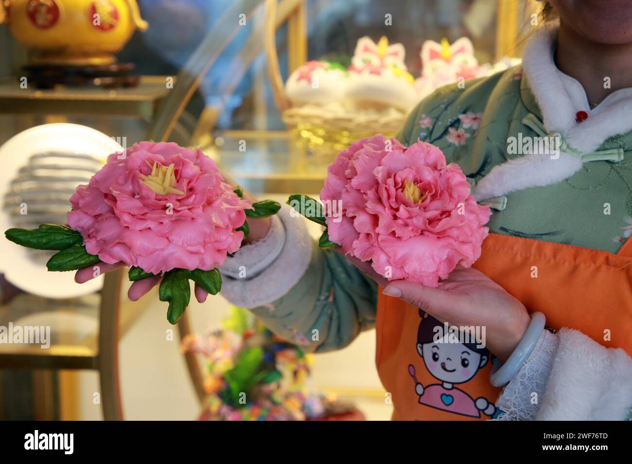 Flower-shaped steamed buns are made to celebrate the Spring Festival in ...