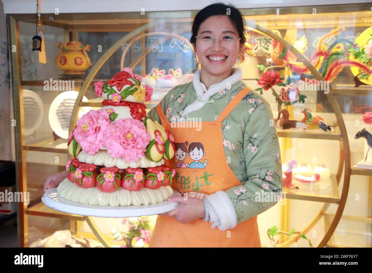 Flower-shaped steamed buns are made to celebrate the Spring Festival in ...