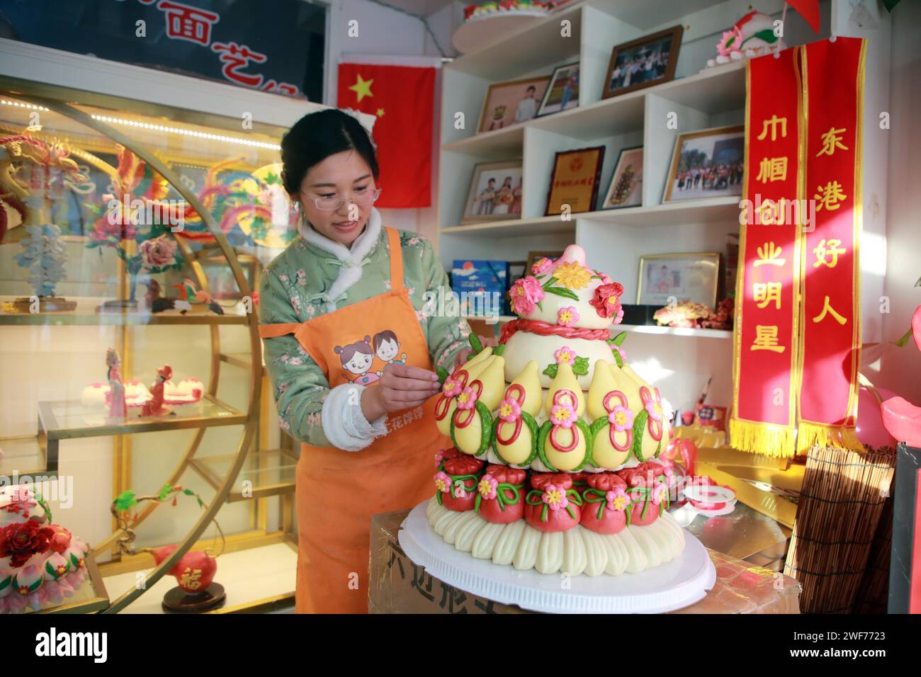 Flower-shaped steamed buns are made to celebrate the Spring Festival in ...
