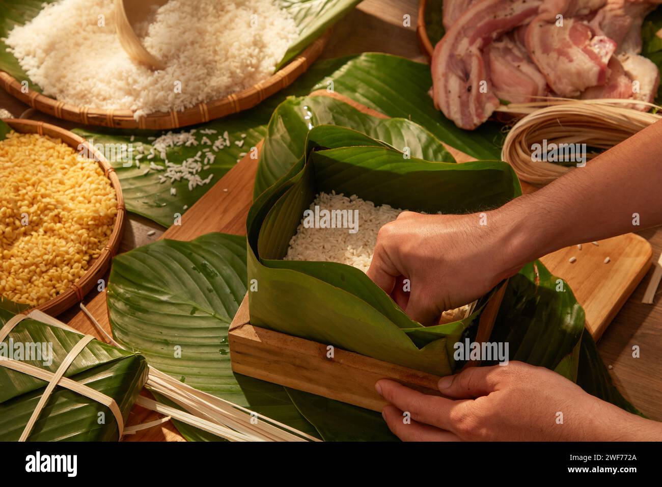 Vietnamese traditional Chung cake with dong leaves, pork glutinous rice ...