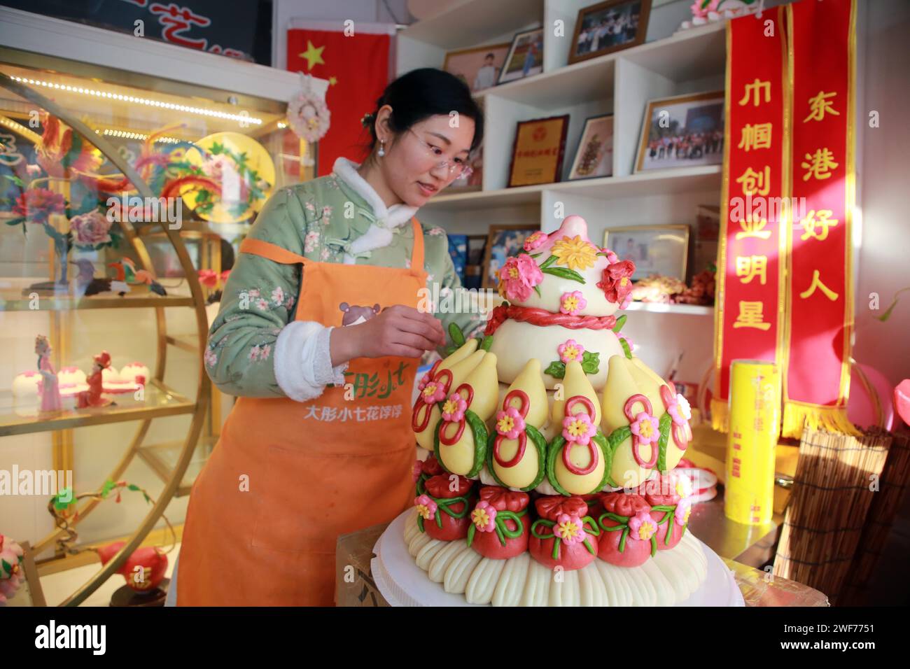 Flower-shaped steamed buns are made to celebrate the Spring Festival in ...