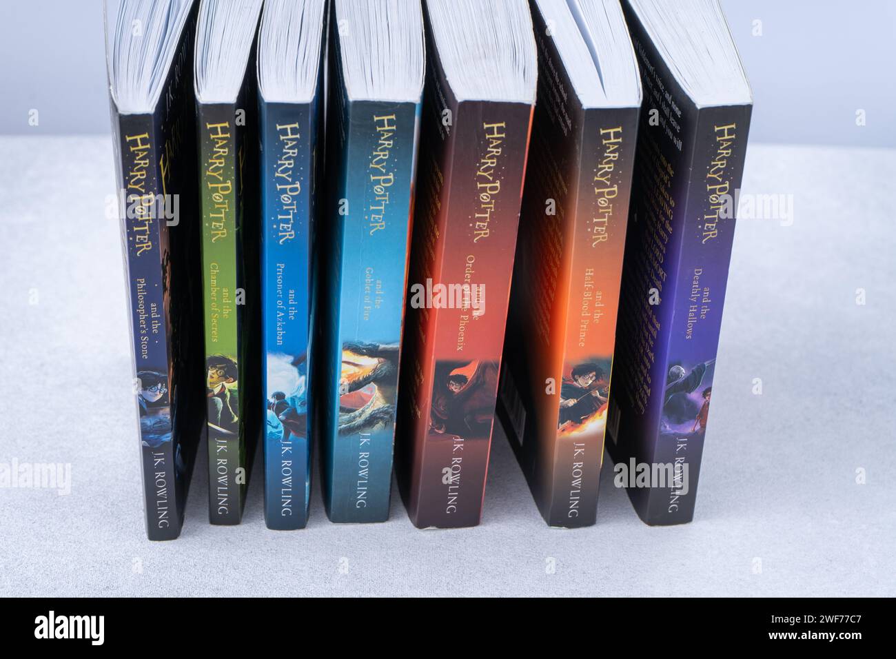 A stack of books about Harry Potter by writer JK Rowling. Collection ...