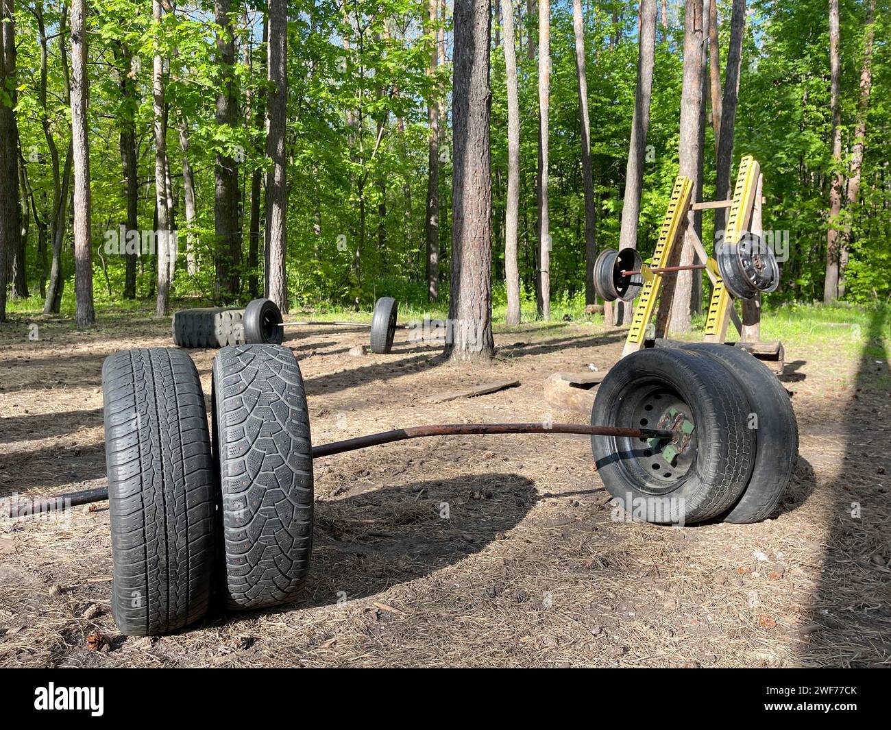 Handmade sports ground with bars made of tires in the forest Stock ...