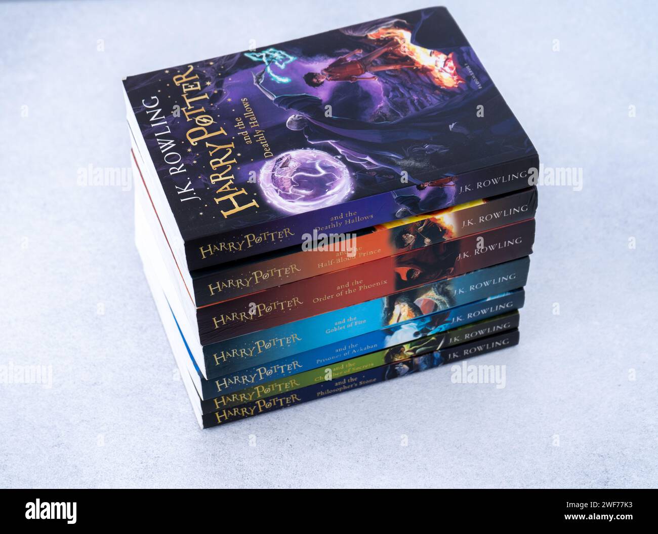 A stack of books about Harry Potter by writer JK Rowling. Collection ...