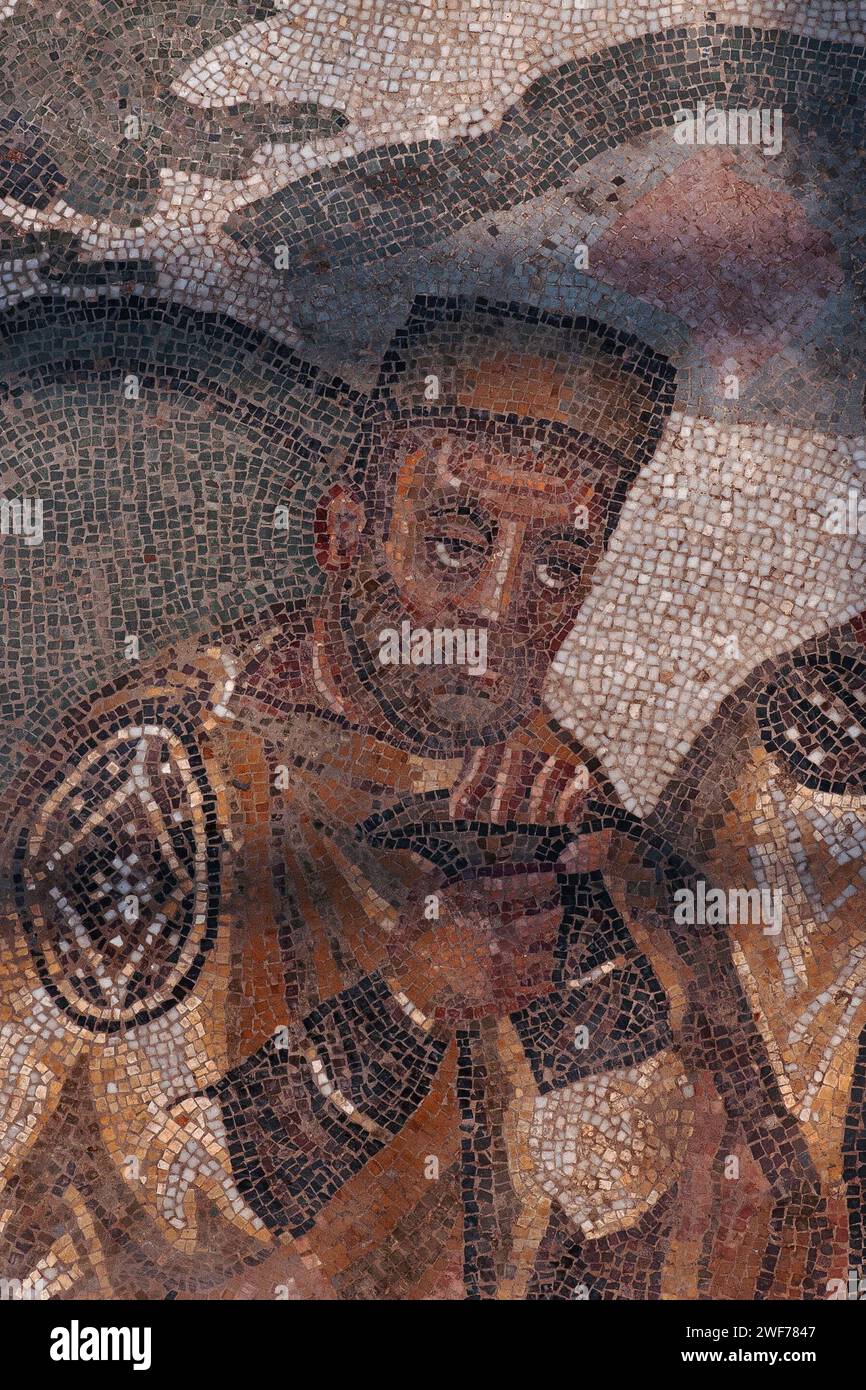 Man in Pannonian hat or Pileus Pannonicus who carries a rod identifying ...