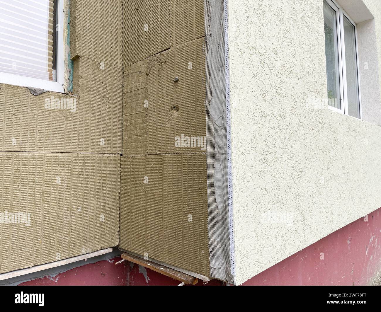 Insulation of external walls of the house and and facade cladding Stock ...