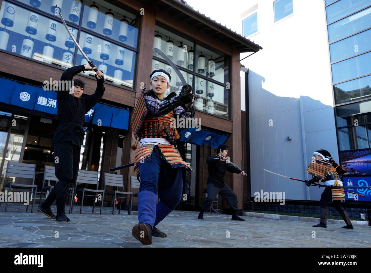 Artists dressed as samurai warriors and ninja perform at "Toyosu ...