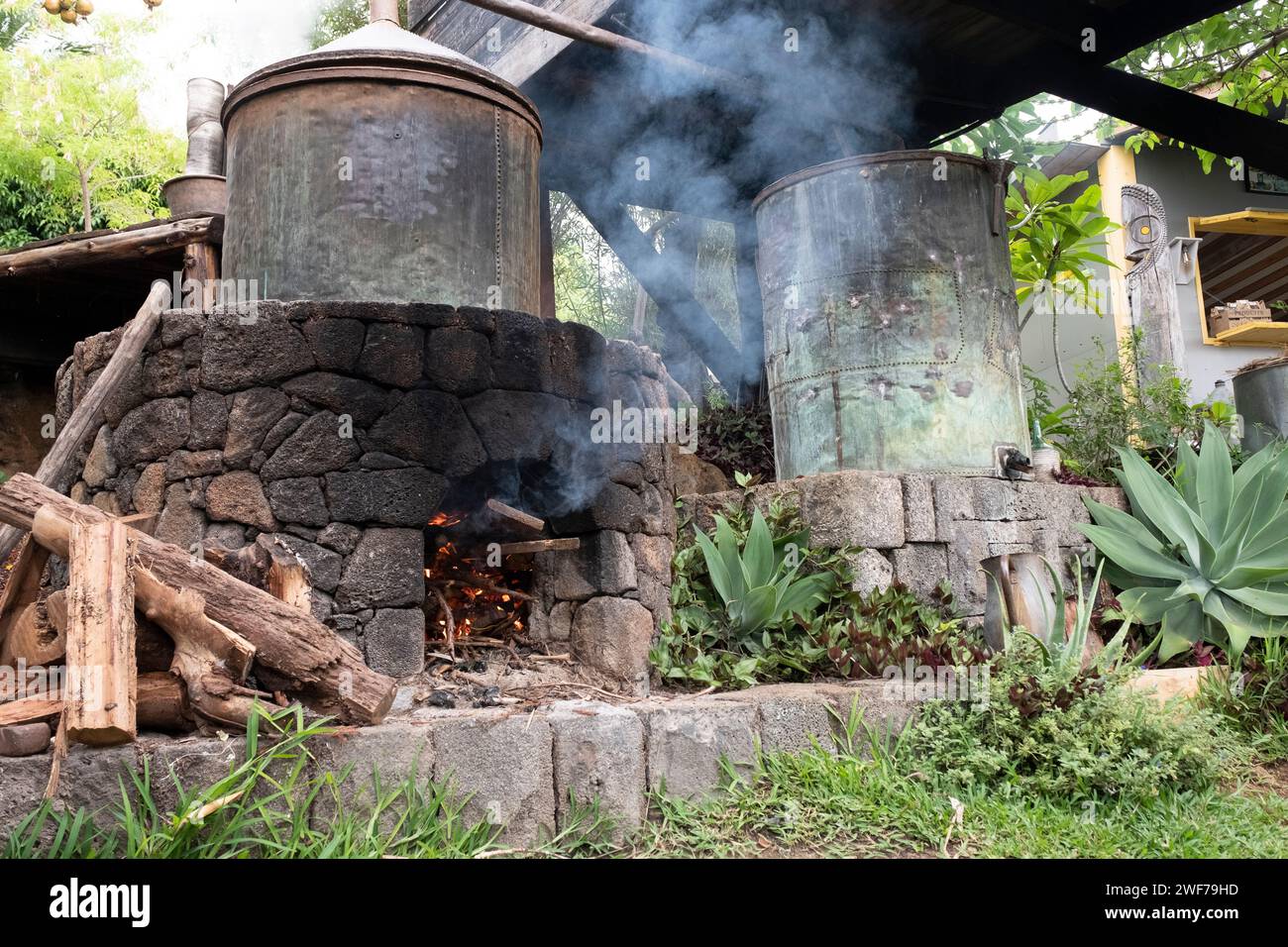 Smoke Rising From Two Large Traditional Outdoor Distillery, on Reunion ...