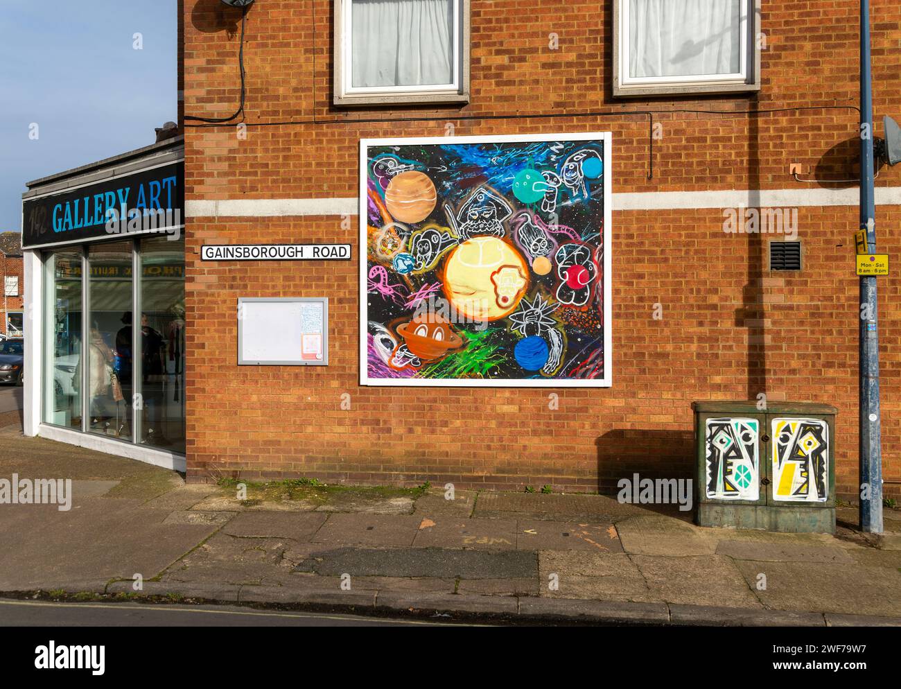 Street art painting on wall outside gallery shop, Felixstowe, Suffolk ...