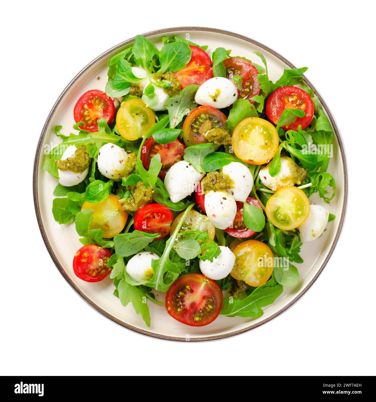 Caprese Salad with Cherry Tomatoes and Pesto Sauce on White Isolated ...