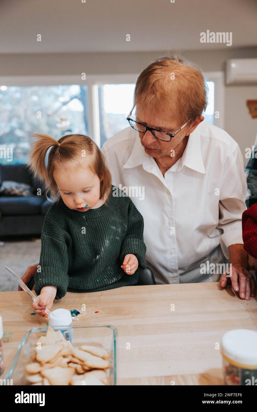 Grandma baking cookies grandchild hi-res stock photography and images ...