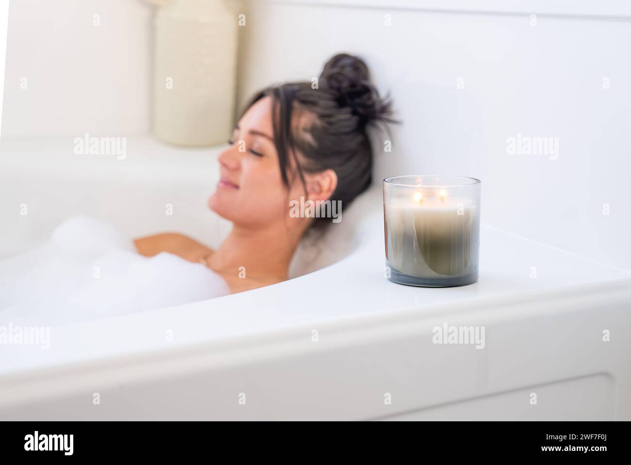 A woman enjoying a soothing bath Stock Photo - Alamy