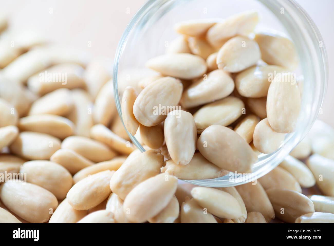 Peeled Almonds in Transparent Bowl Stock Photo - Alamy