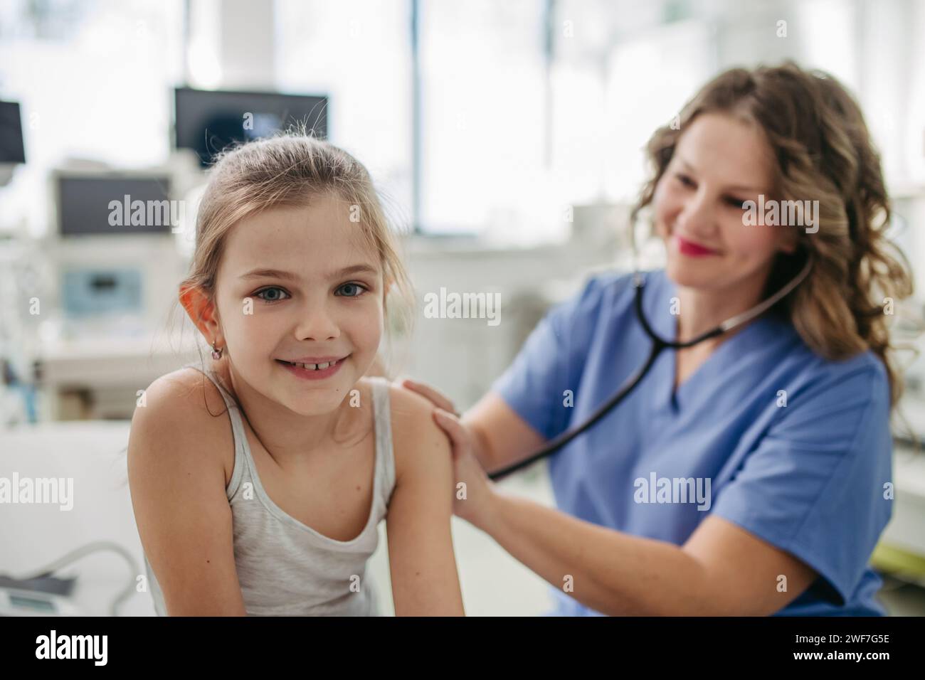 Orthopedist examines the spine, posture, and spinal deformities of ...