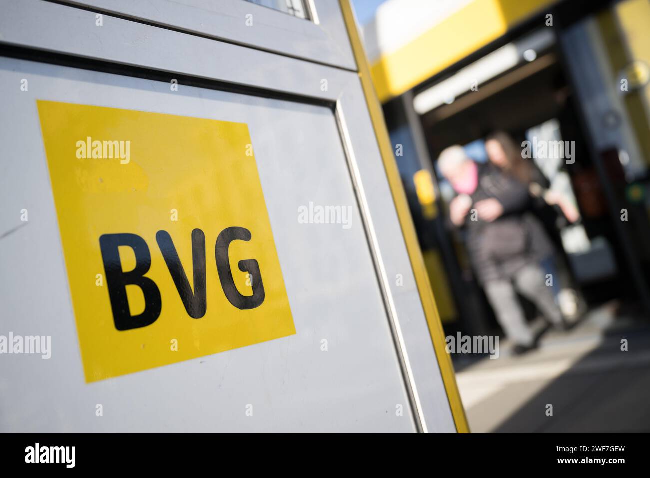 Berlin, Germany. 29th Jan, 2024. Passengers get off a streetcar behind ...