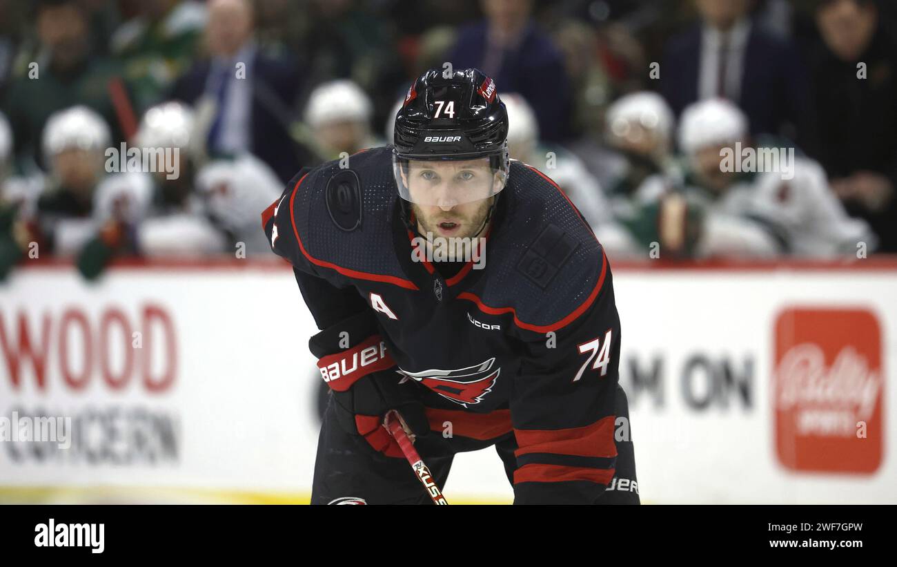 Carolina Hurricanes' Jaccob Slavin (74) watches the puck against the ...