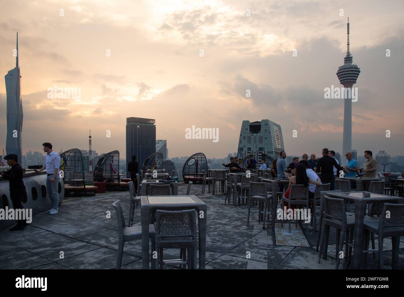 People at roof bar with Kl tower and Merdeka 108 in the background ...