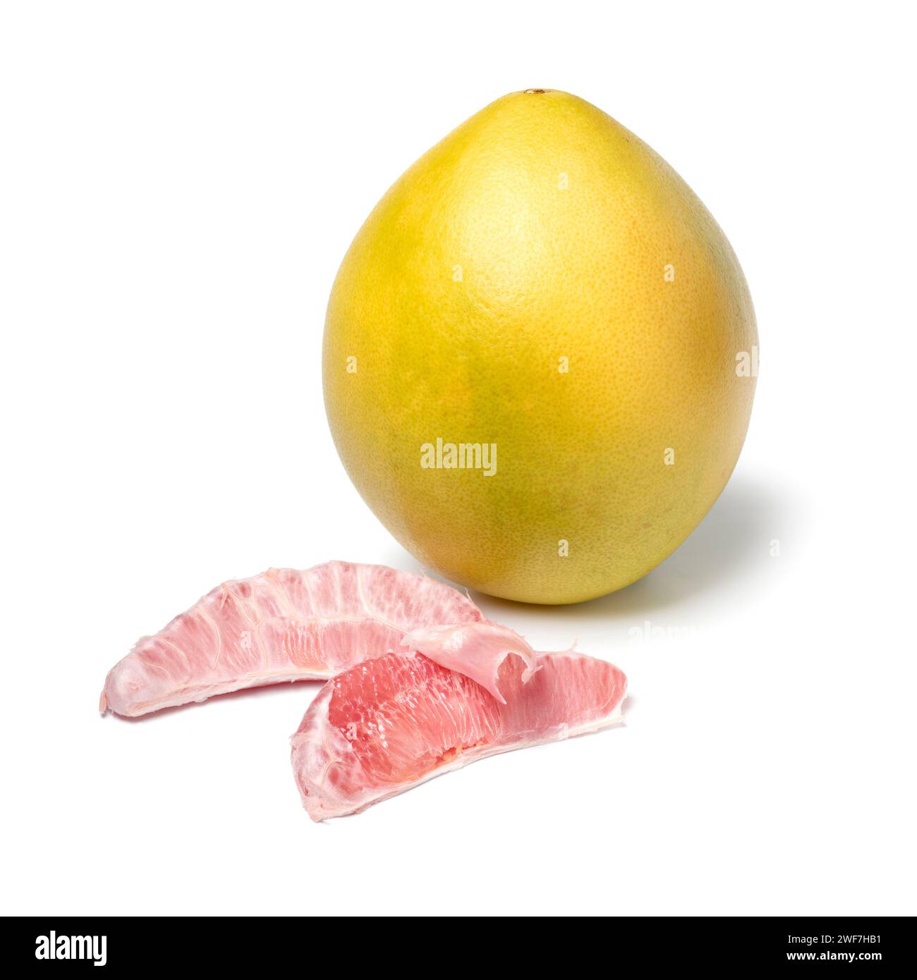 Whole fresh red Pomelo and peeled pomelo slices close up isolated on ...