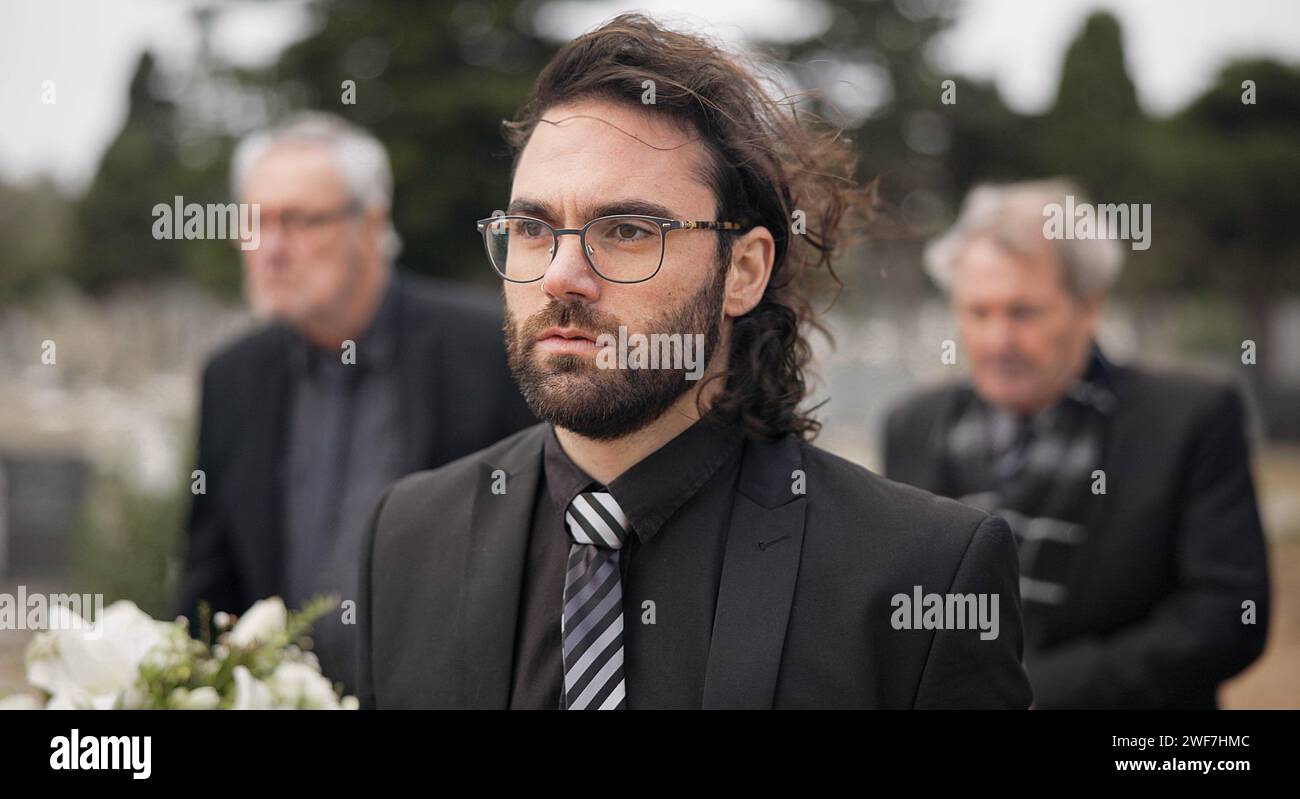 Funeral, death and man carry coffin with family in grief, mourning and ...