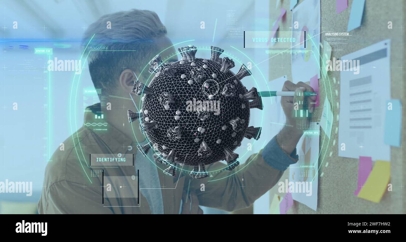 Image of spinning covid-19 cell with man in office wearing face masks ...