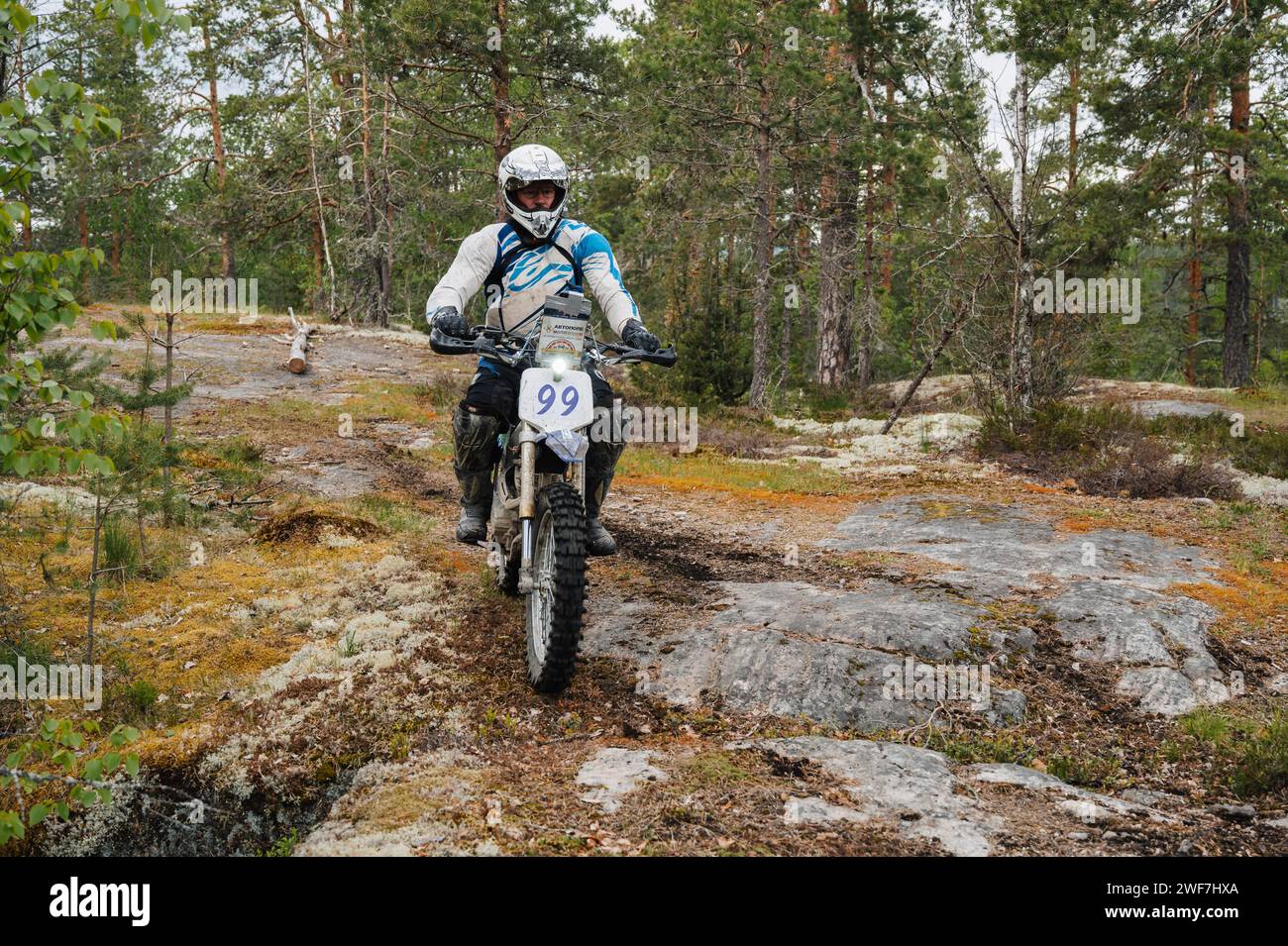 Man rides motorcycle through mud hi-res stock photography and images ...