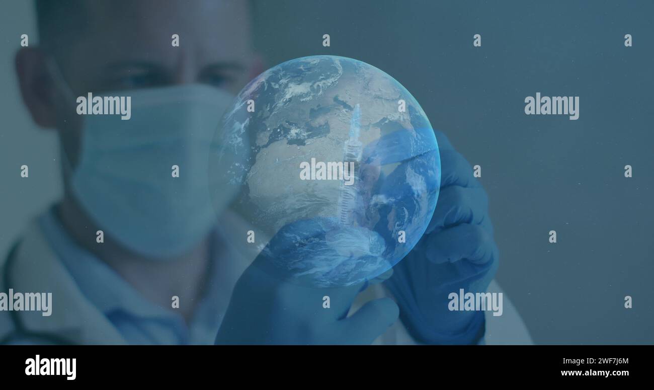 Image of globe spinning with doctor poking syringe wearing face masks ...