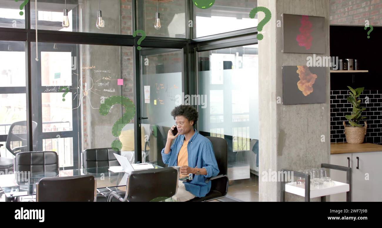 Image of question marks over african american businessman in office ...