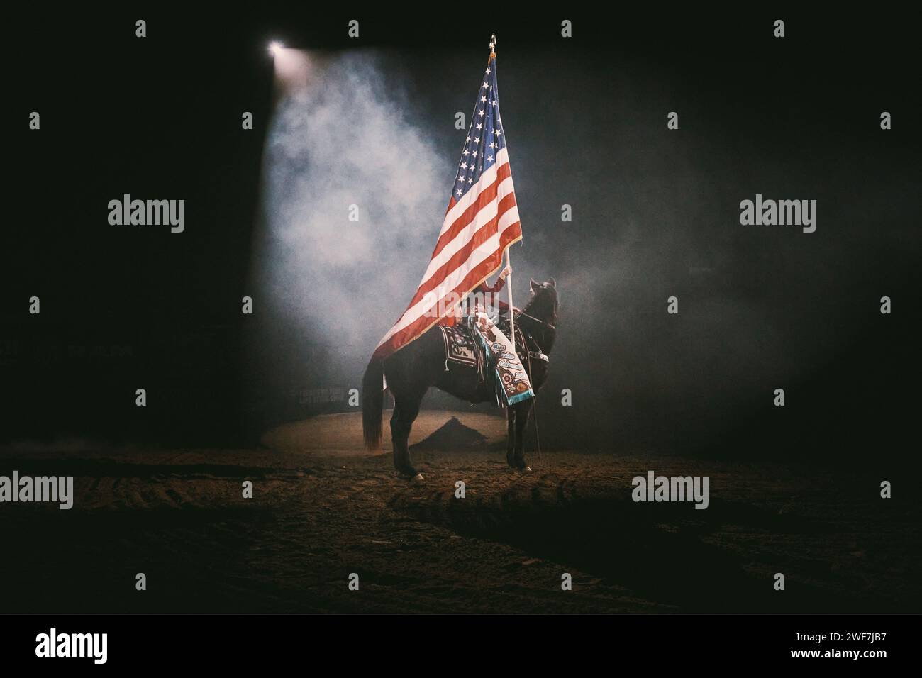 American flag being held at rodeo on horseback Stock Photo - Alamy