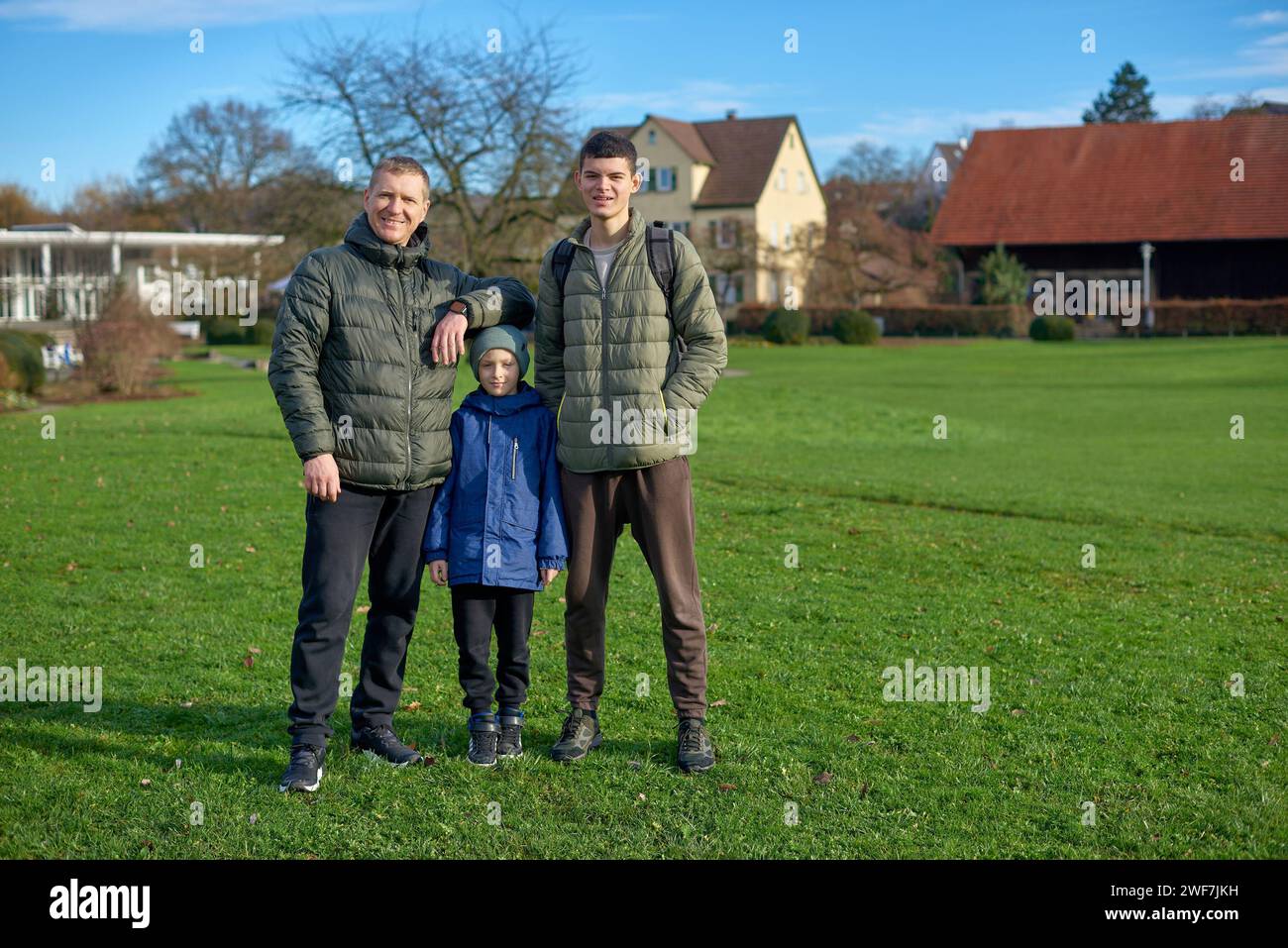 Family Harmony: Father, 40 Years Old, and Two Sons - Beautiful 8-Year ...