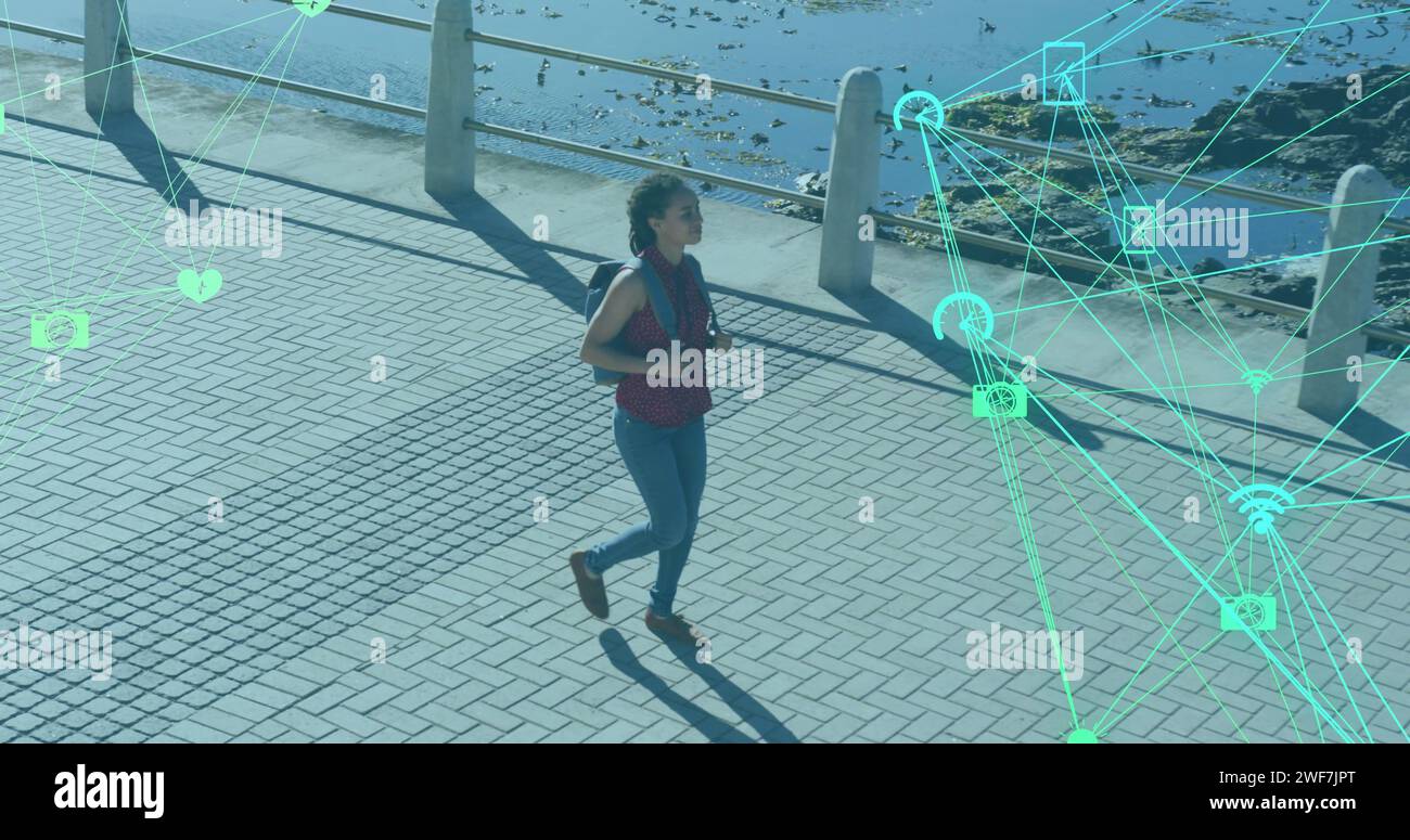 Image of network of connections with technological icons over woman ...