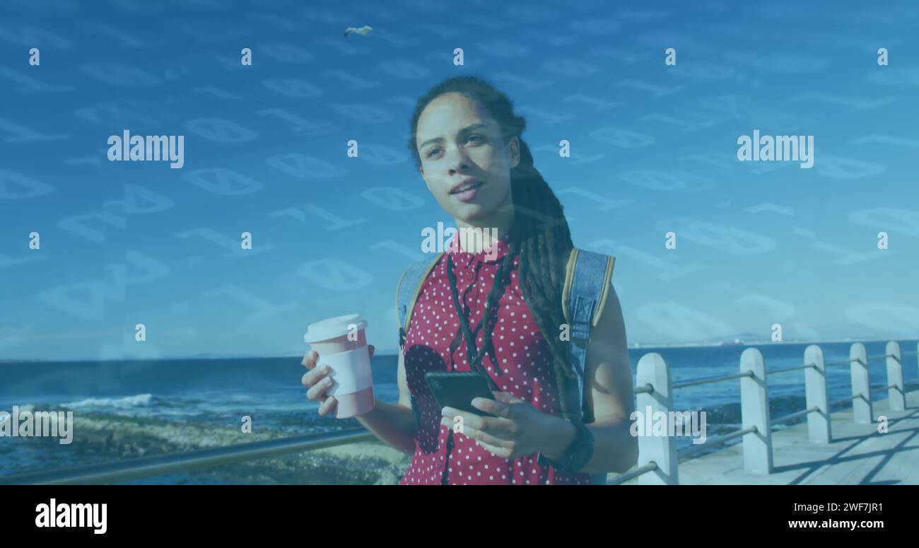 Image of floating numbers over woman drinking coffee and using ...