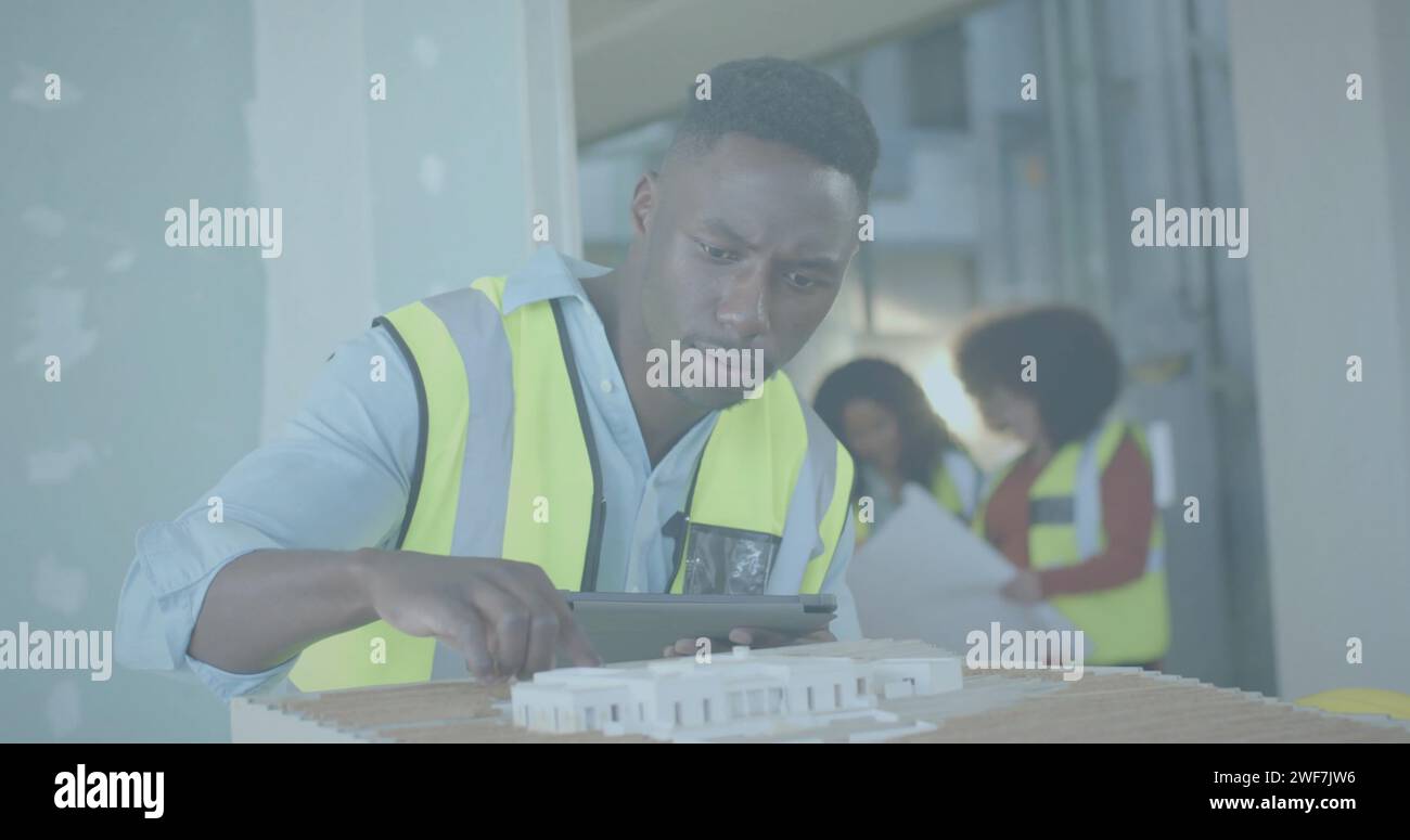 Image of data processing over biracial male engineer in hi vis vest ...