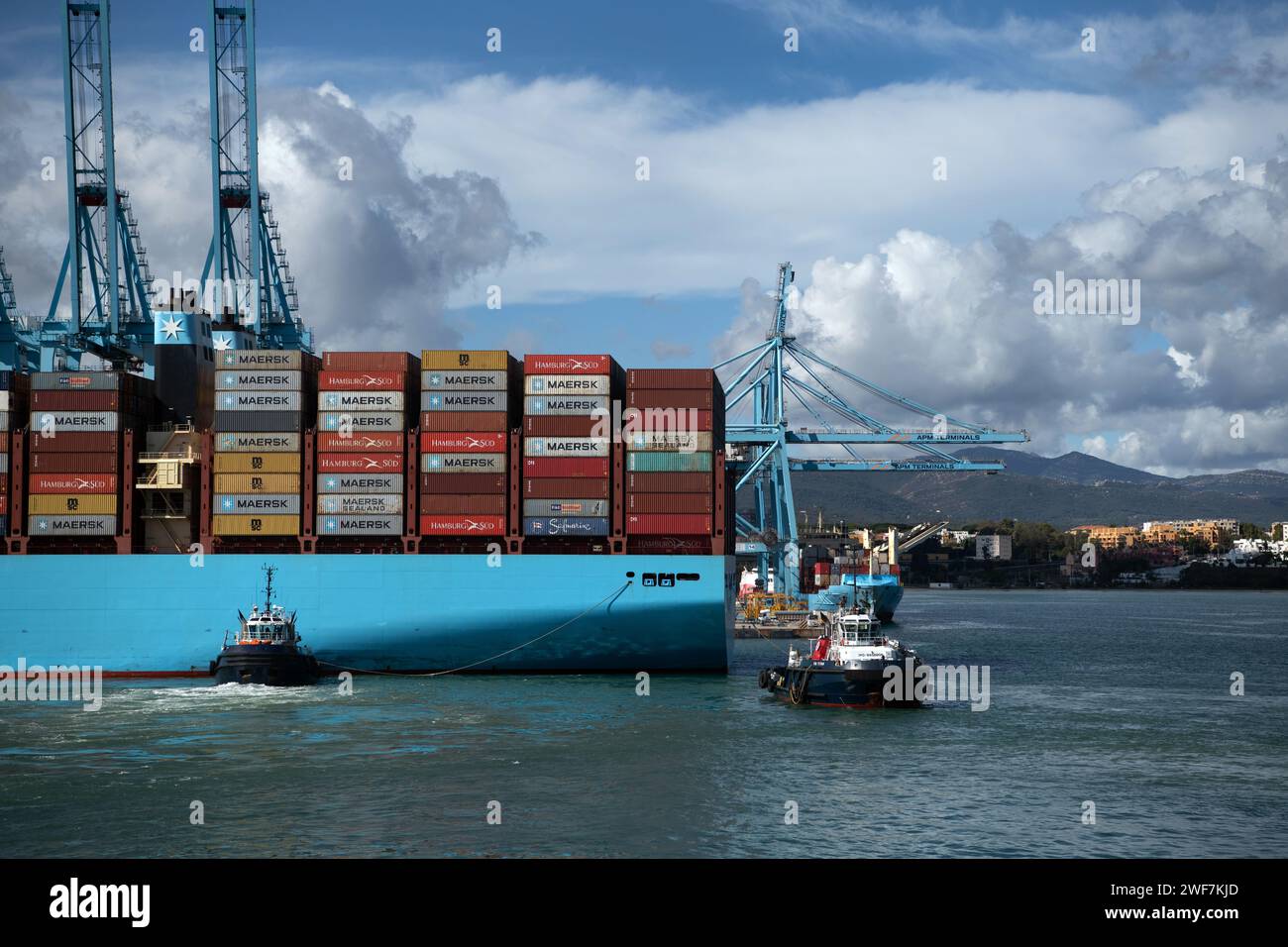 Shipping containers being unloaded from a Maersk ship, Algeciras ...