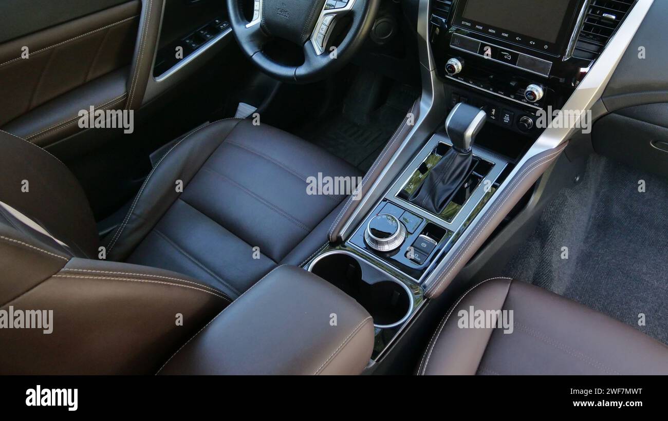 Top view of the center panel and armrest between the seats in leather ...