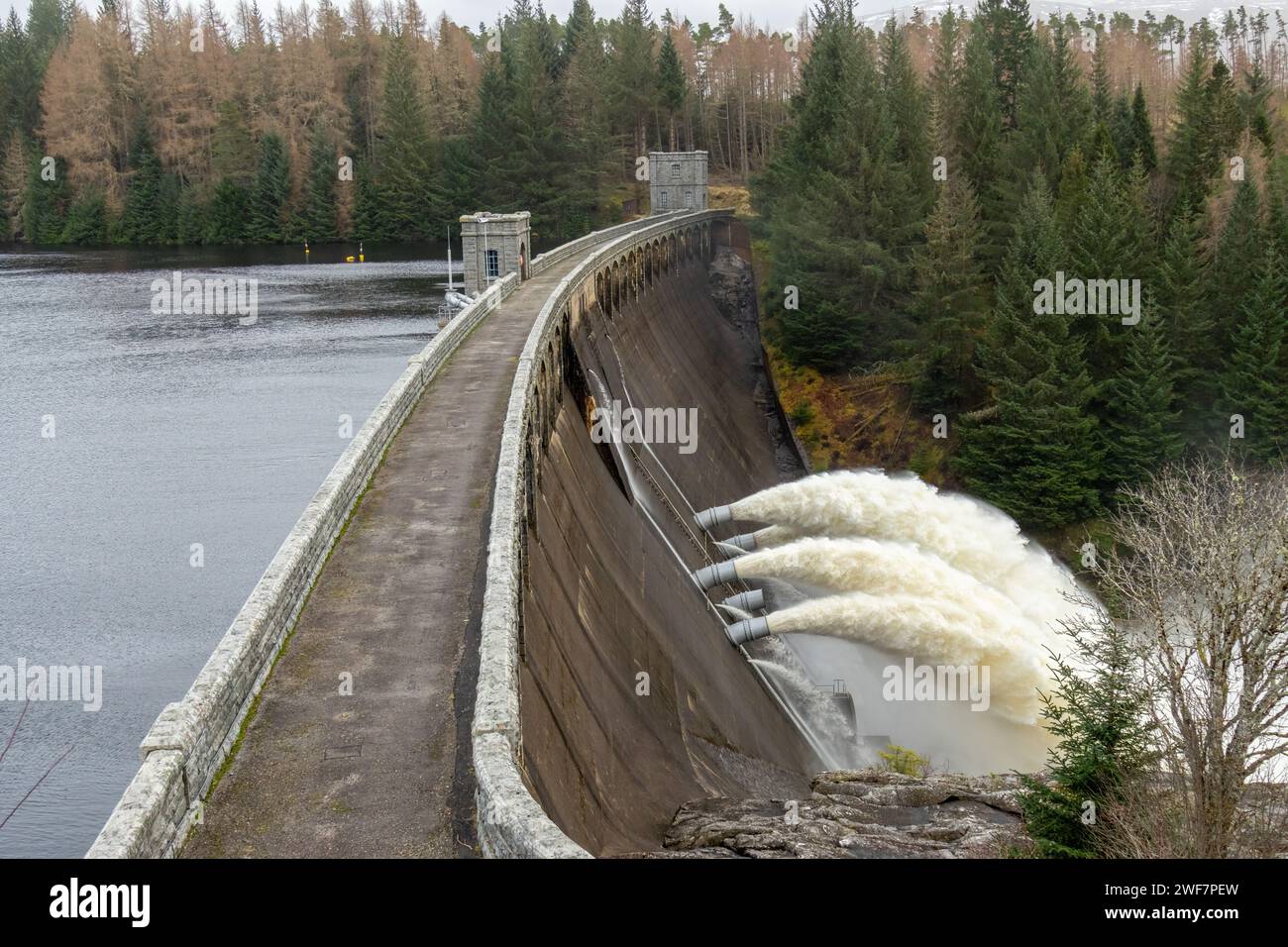 Laggan dam with the power of water flowing through the pipes Stock ...