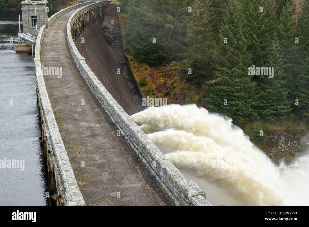 Laggan dam with the power of water flowing through the pipes Stock ...