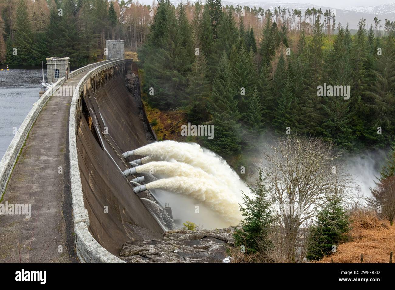 Laggan dam with the power of water flowing through the pipes Stock ...
