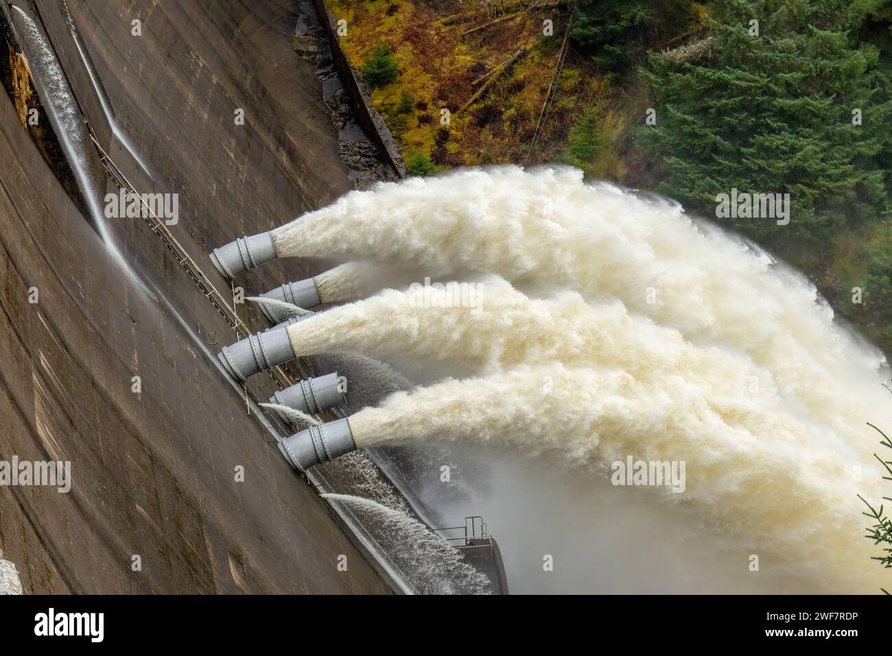 Laggan dam with the power of water flowing through the pipes Stock ...