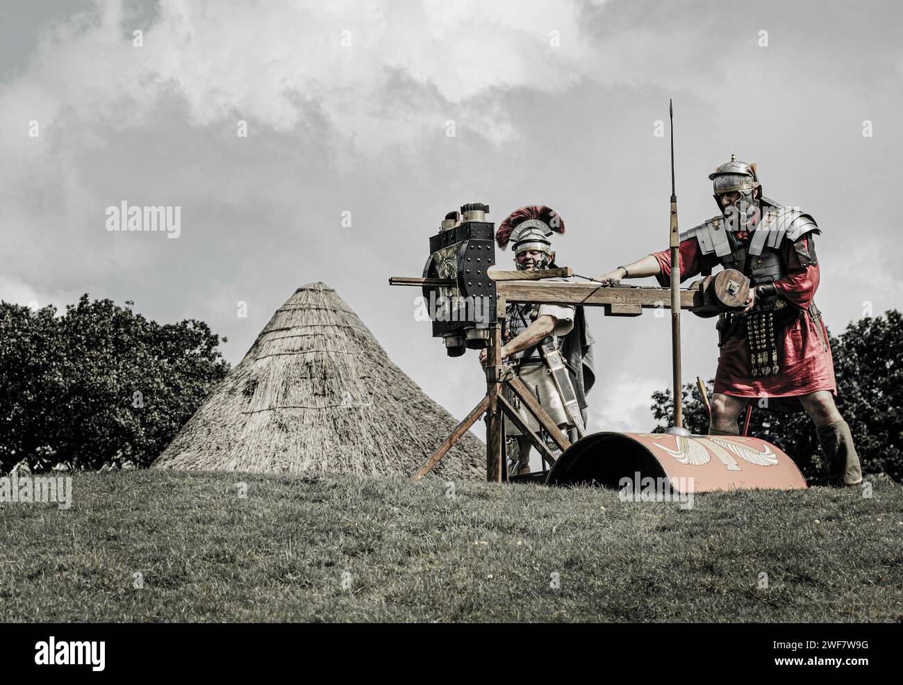 Roman shooting arrows at a target and an iron age village Stock Photo ...
