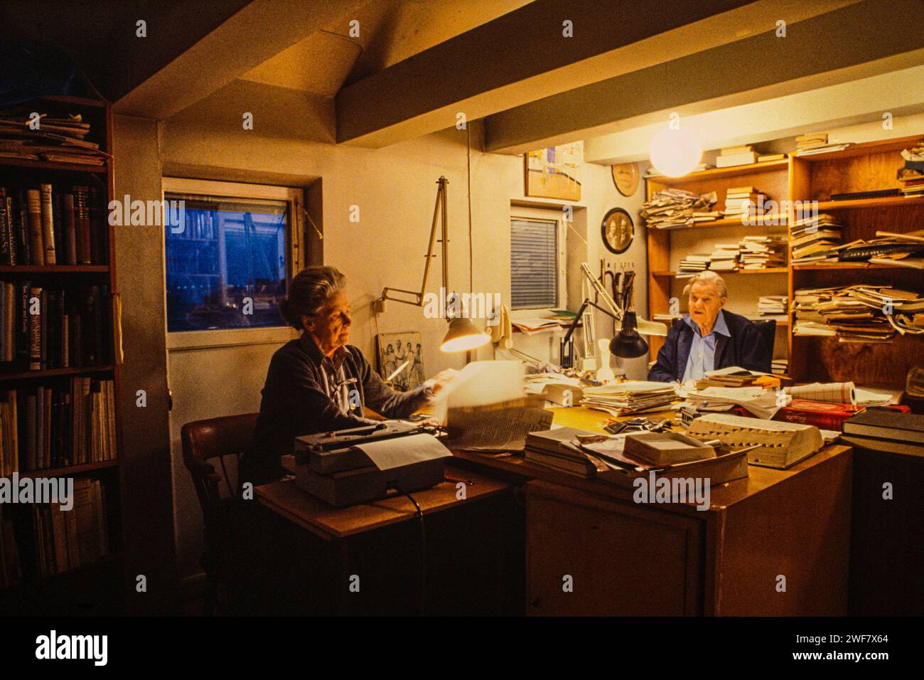 Alva and Gunnar Myrdal in their study in the Old Town, Stockholm. Nobel ...