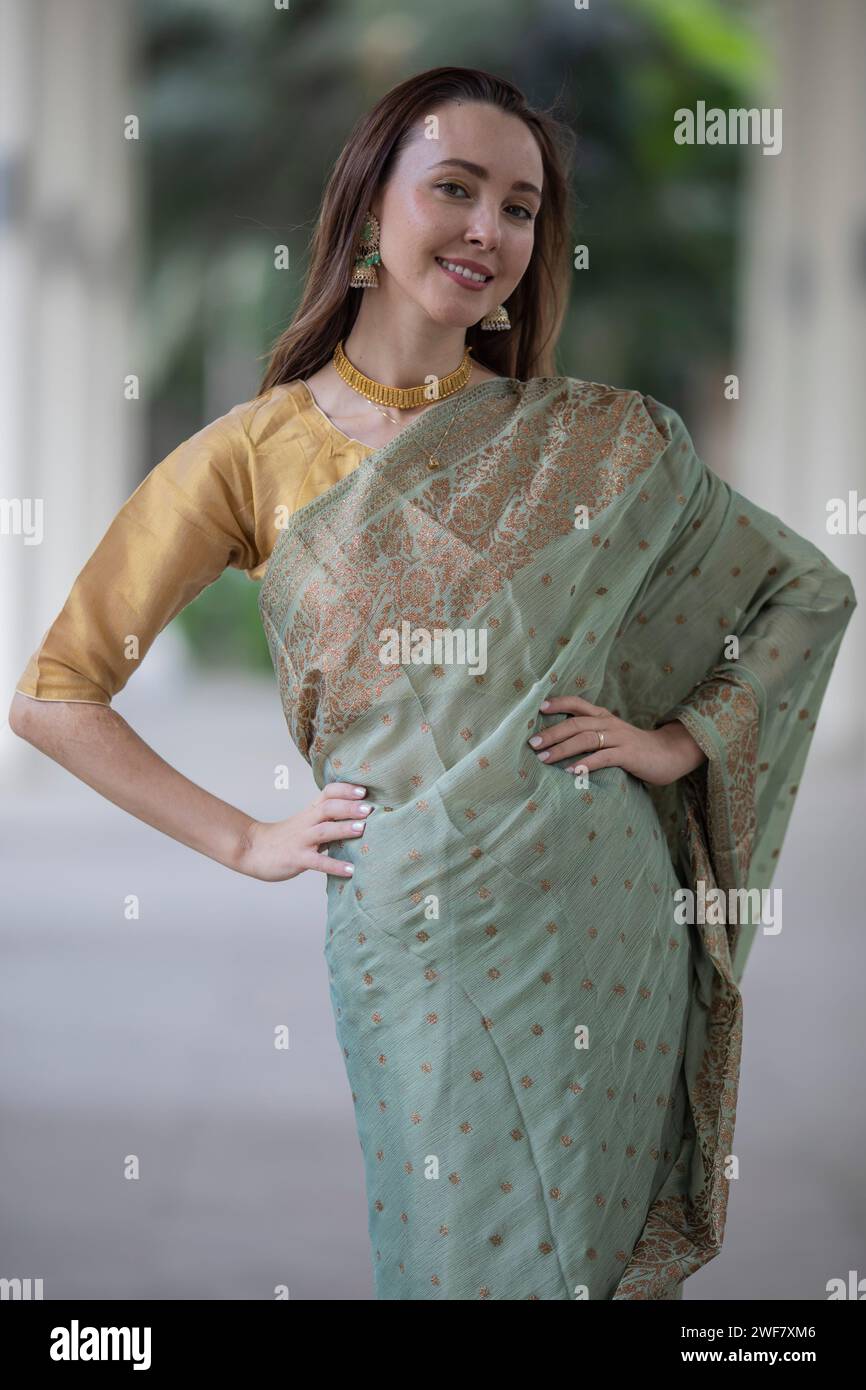 Katerina Khramova poses for photos in a saree during the 22nd Dhaka International Film Festival ...