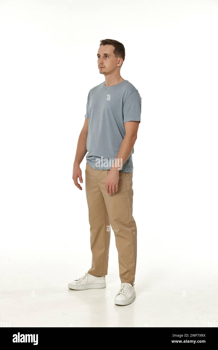 handsome young calm man on white background Stock Photo - Alamy