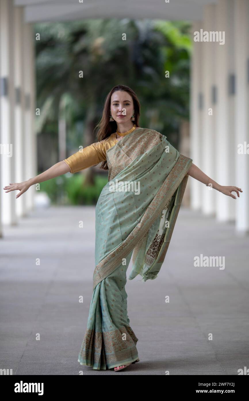 Dhaka, Bangladesh. 28th Jan, 2024. Katerina Khramova poses for photos in a saree during the 22nd ...